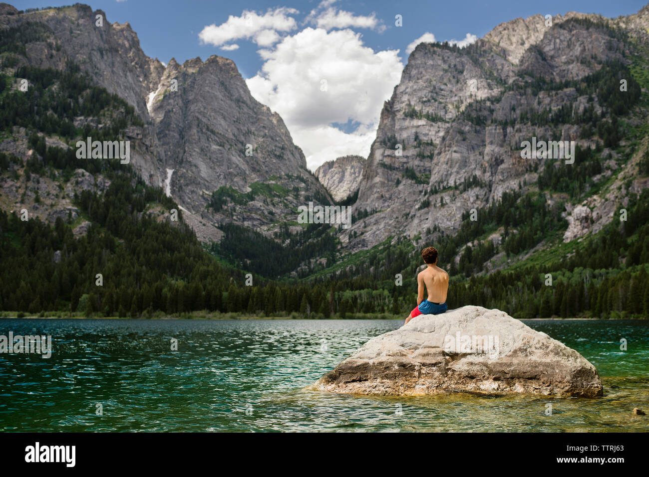 Boy trunks sitting hi-res stock photography and images - Alamy