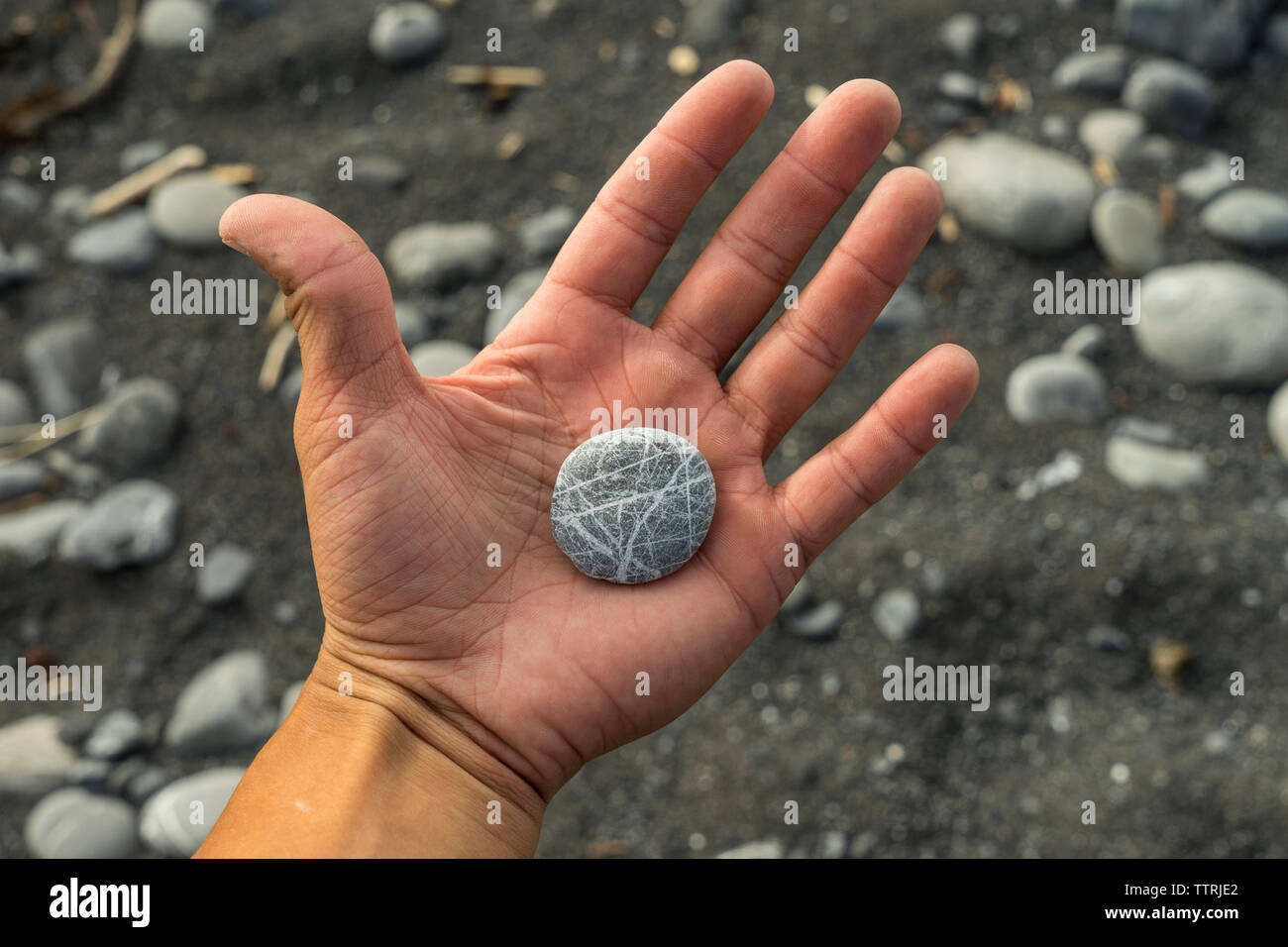 Hand pebbles hi-res stock photography and images - Alamy