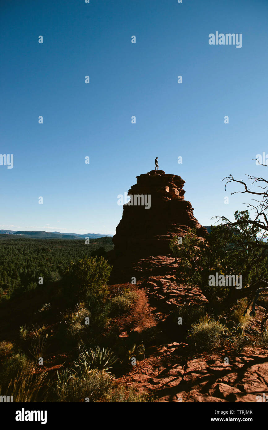 Hiking man standing he mountains hi-res stock photography and images ...