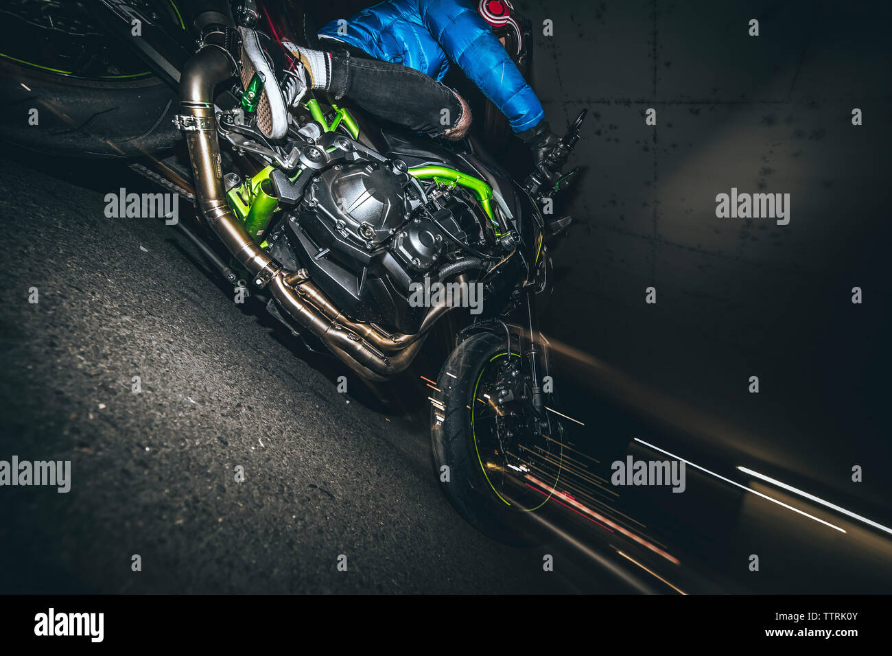 Biker riding motorcycle low angle hi-res stock photography and images ...