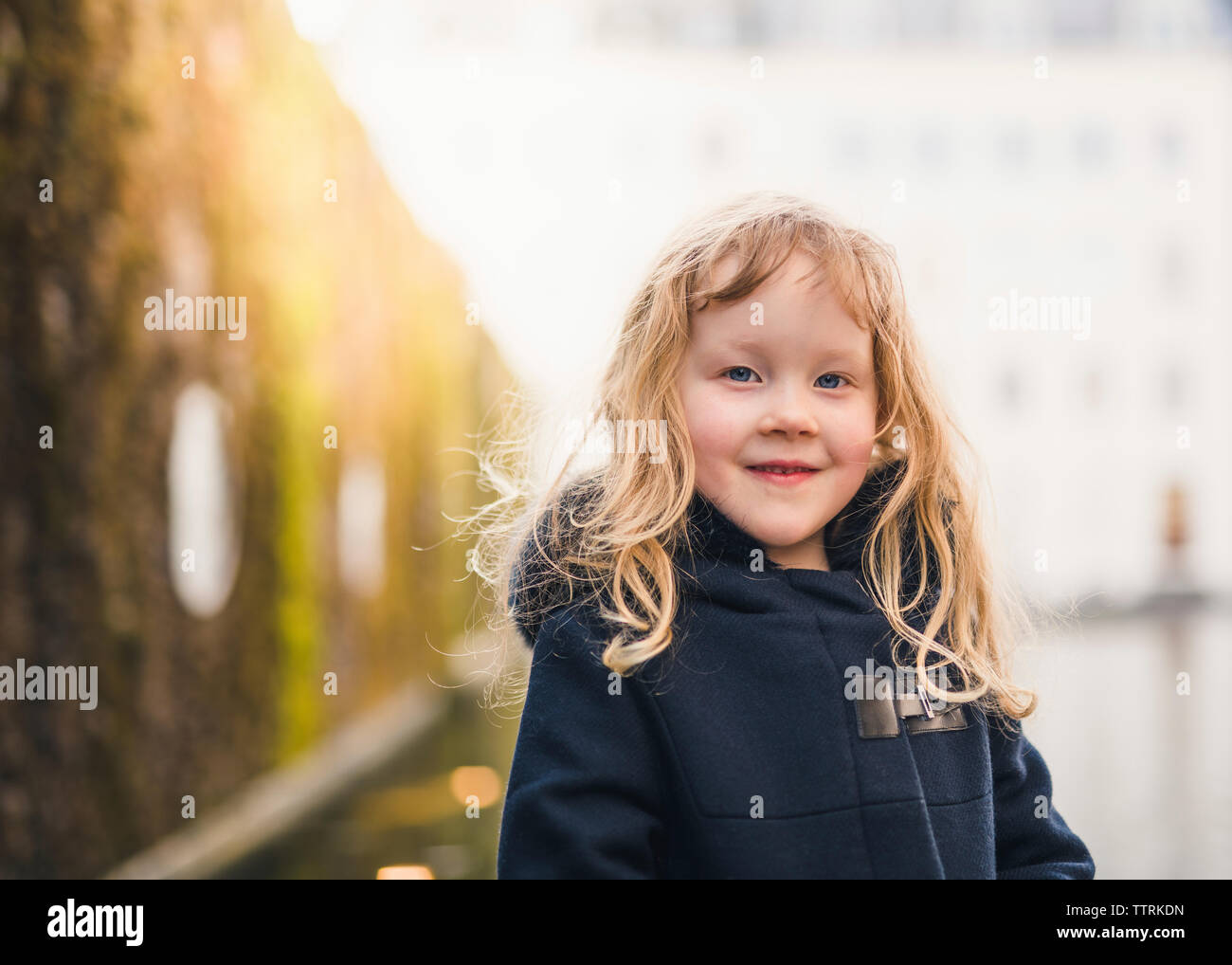 Girl wearing warm coat hi-res stock photography and images - Alamy
