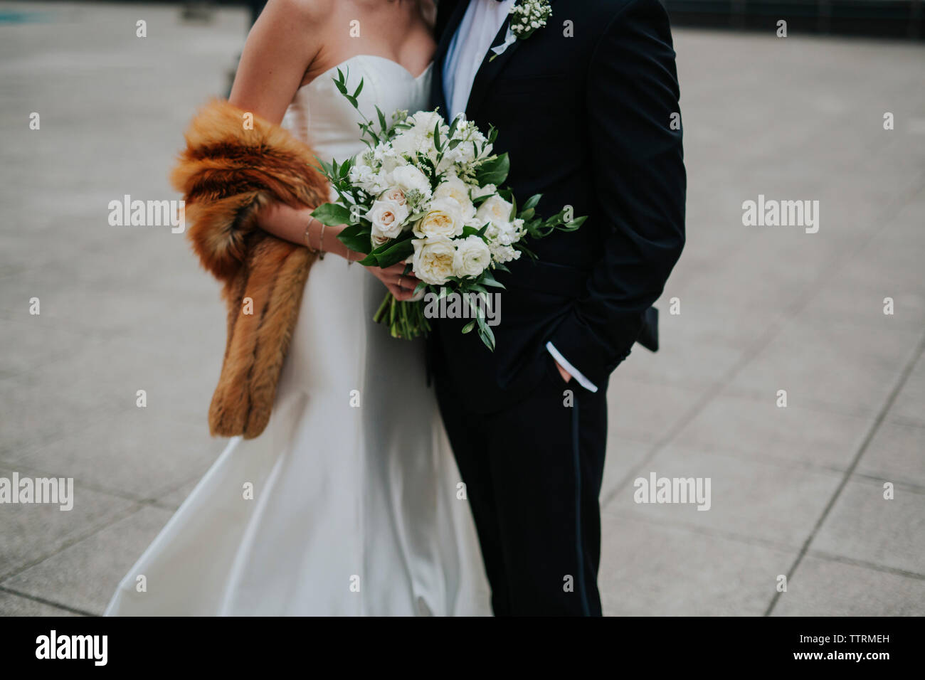 Couple standing outdoors hi-res stock photography and images - Alamy