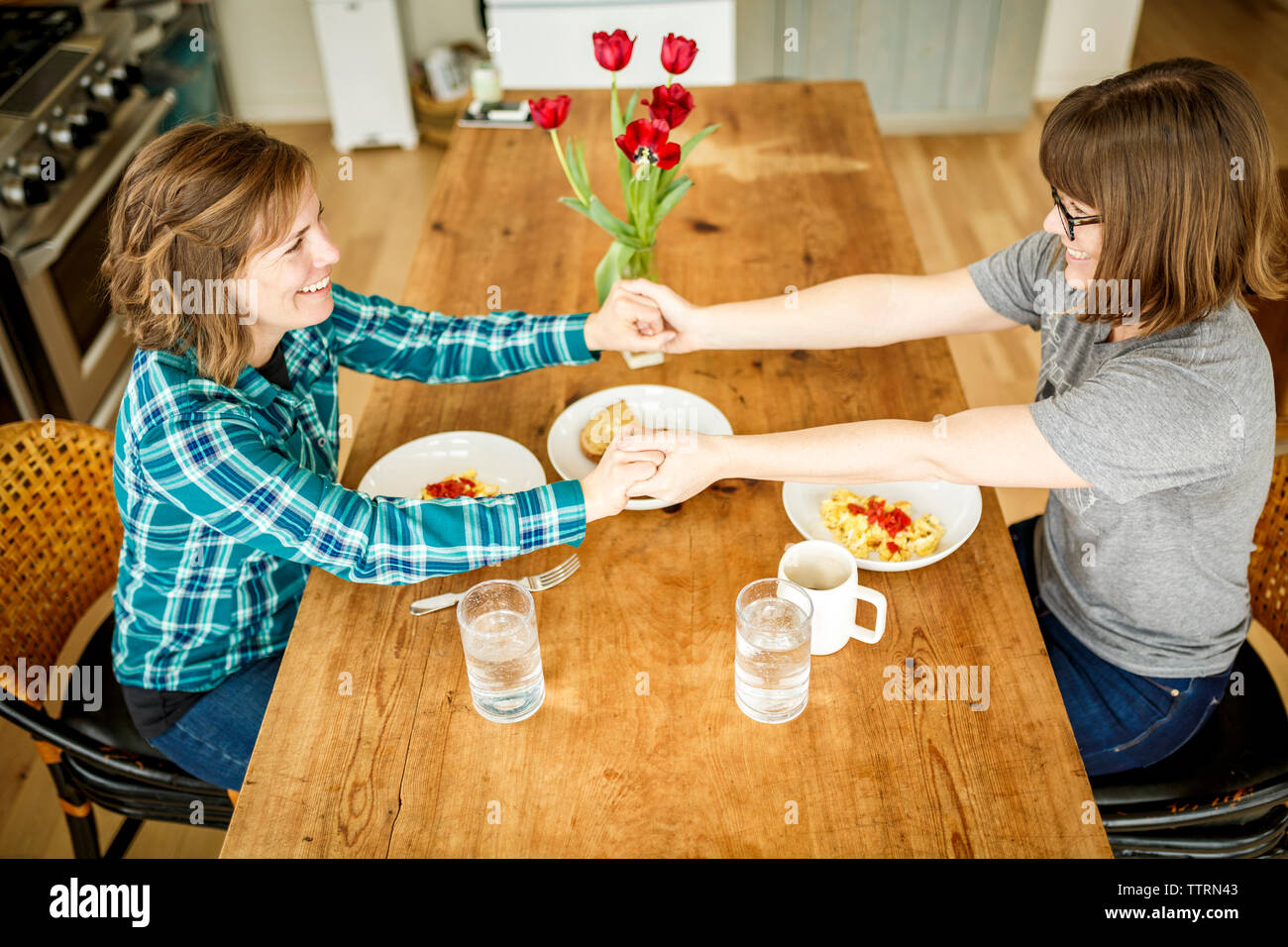 Two people praying together hi-res stock photography and images - Alamy