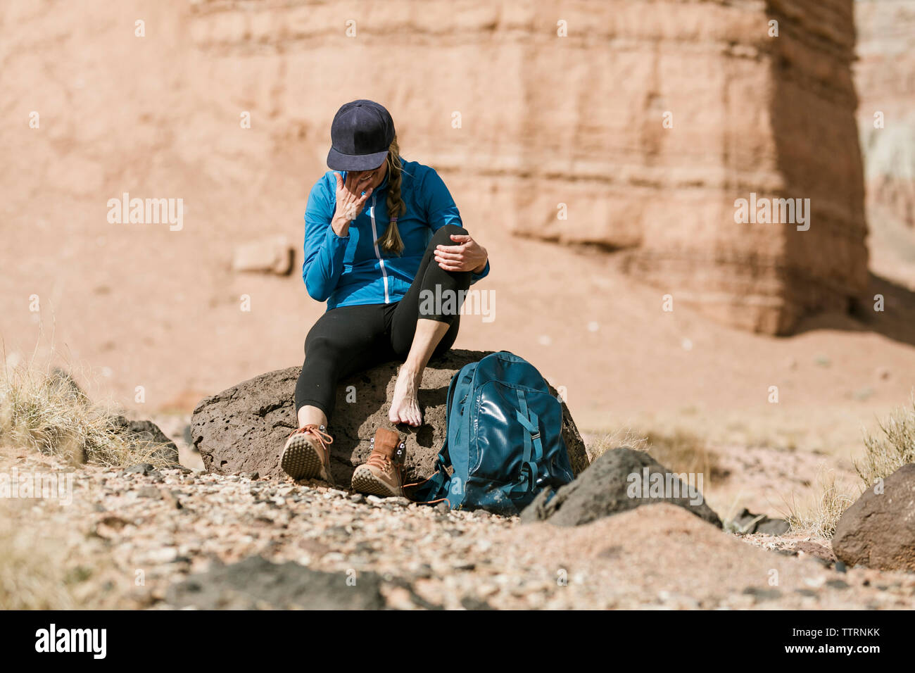 Tired hiker woman relaxing backpack hi-res stock photography and images ...