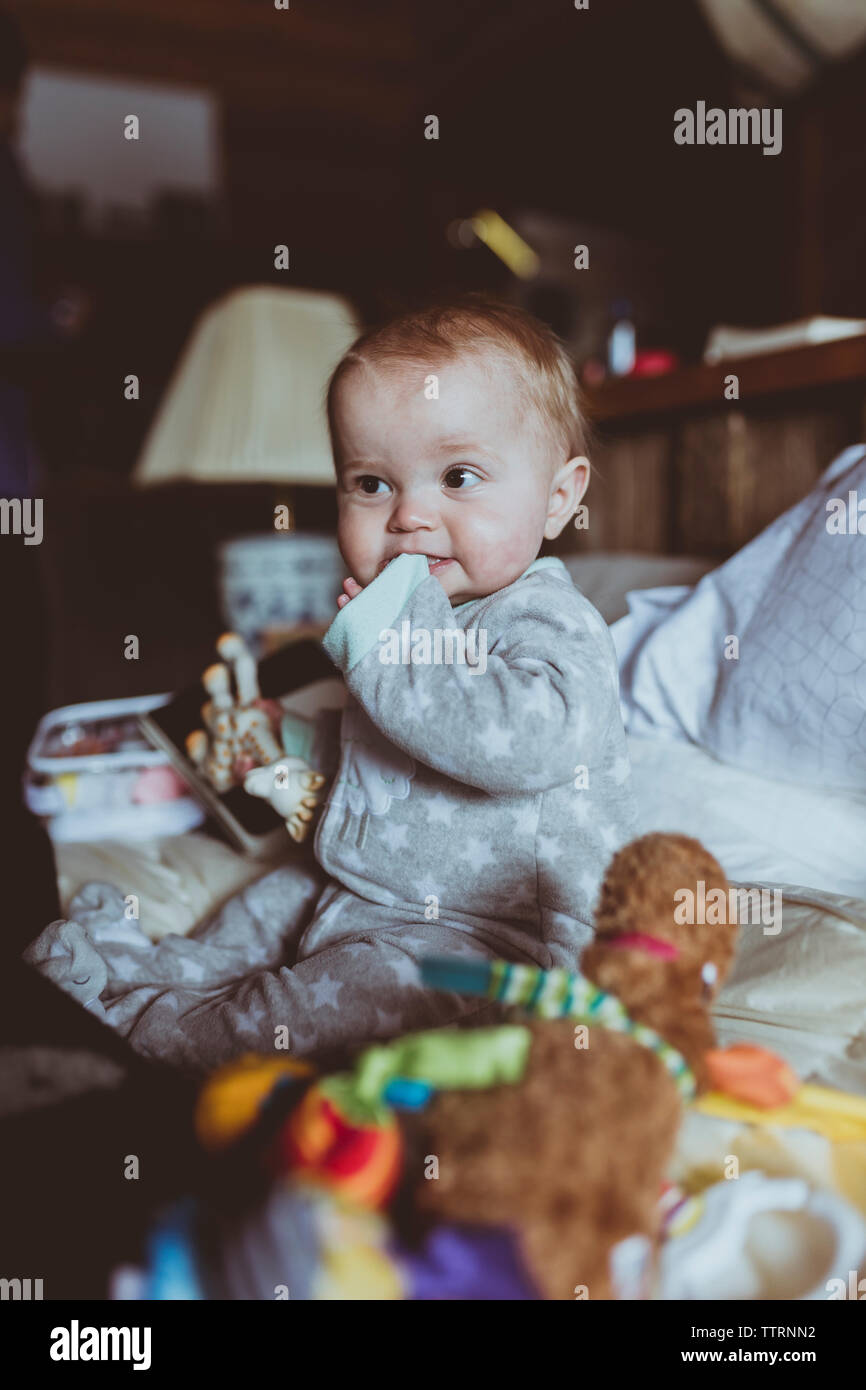 Baby biting hi-res stock photography and images - Alamy