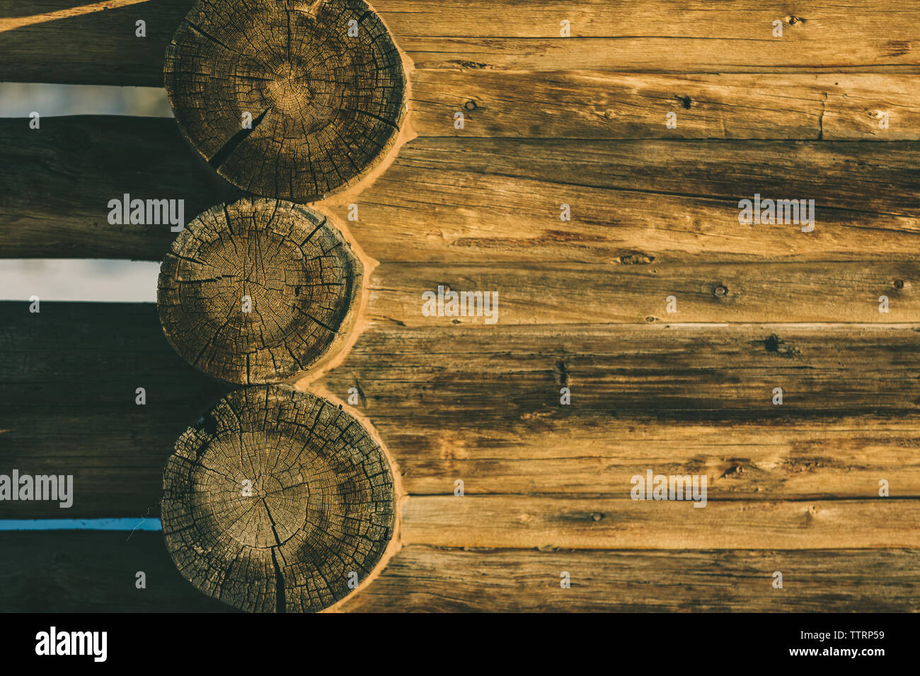 Log cabin circular siding background Stock Photo - Alamy