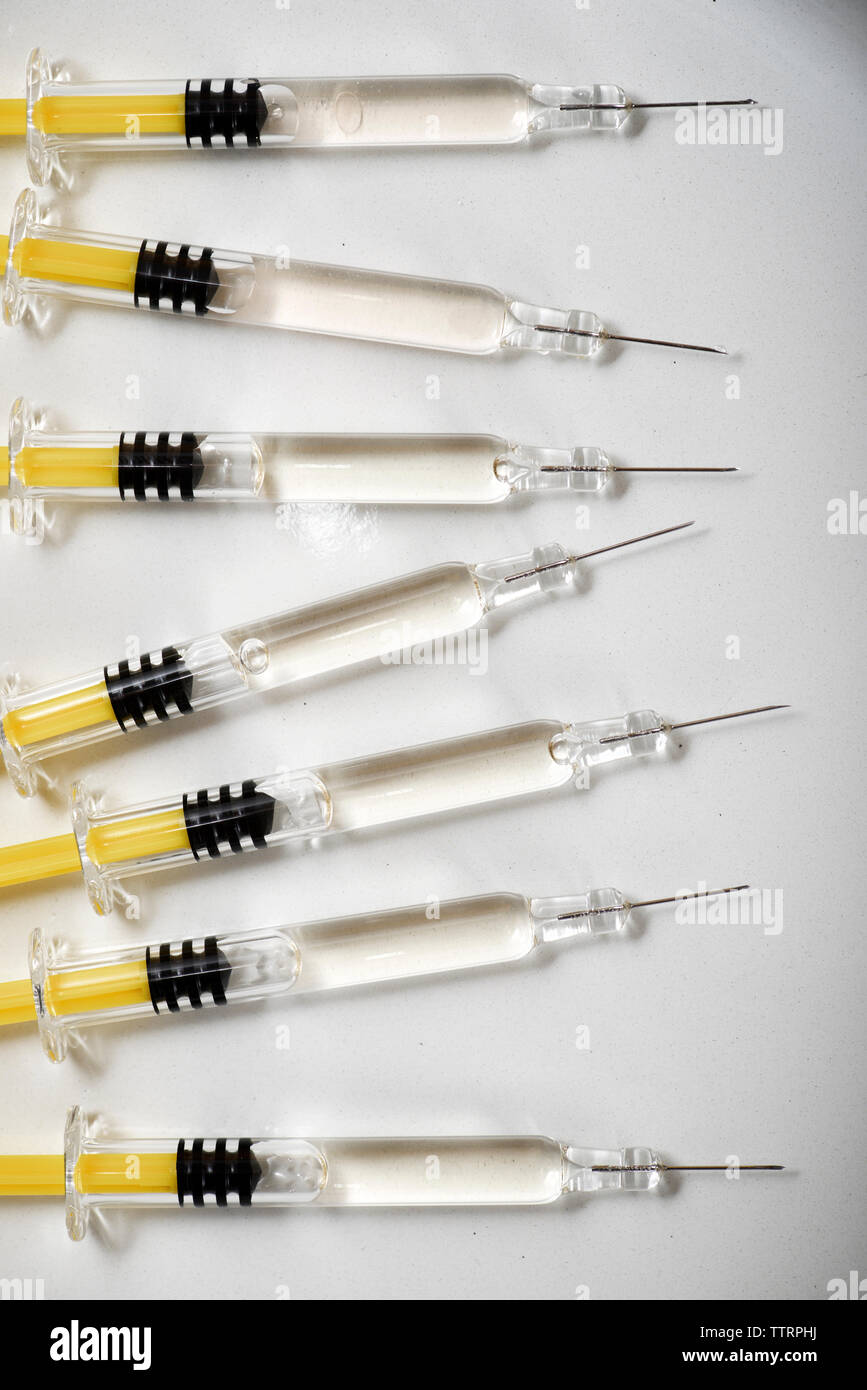 Arrangement of medicine syringes hi-res stock photography and images ...