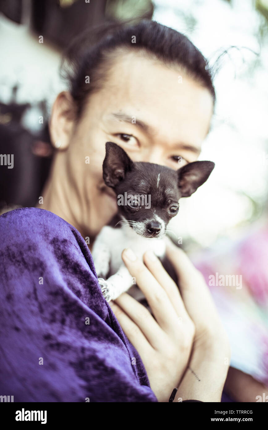 Man holding puppy hi-res stock photography and images - Alamy