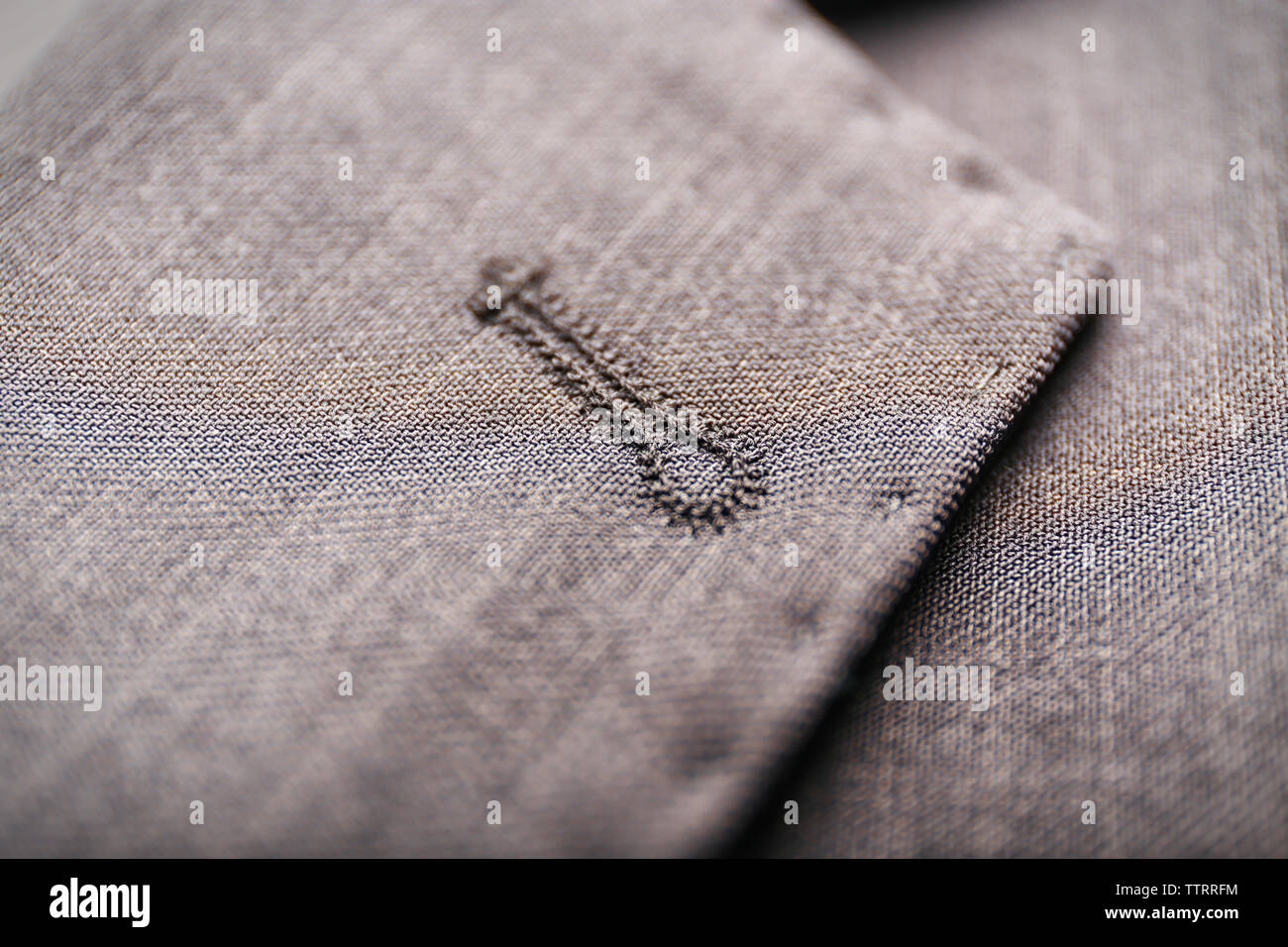Garment button hole sewing hi-res stock photography and images - Alamy