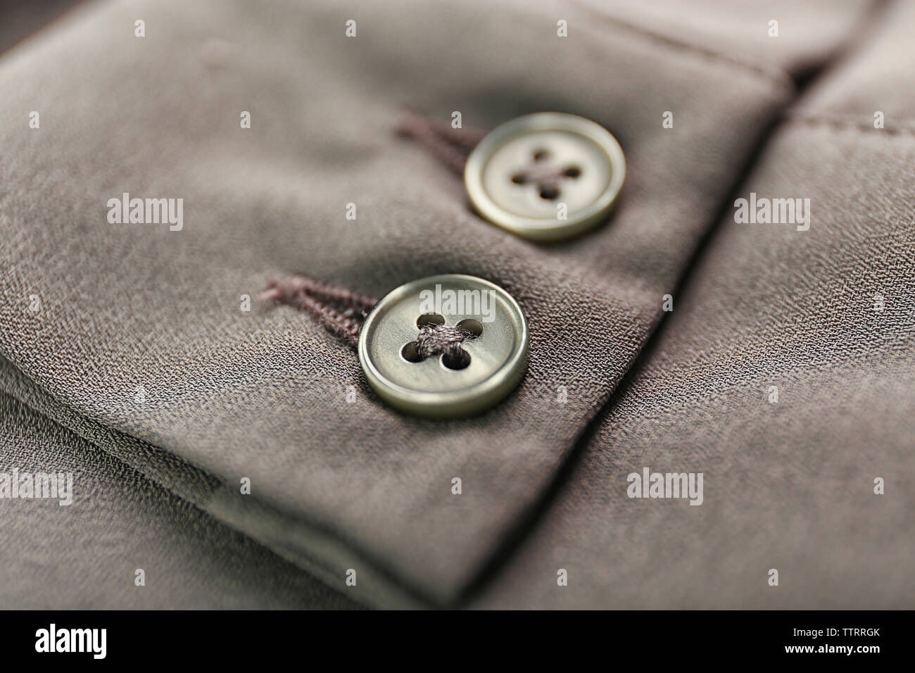 Buttons on clothes, close up Stock Photo - Alamy