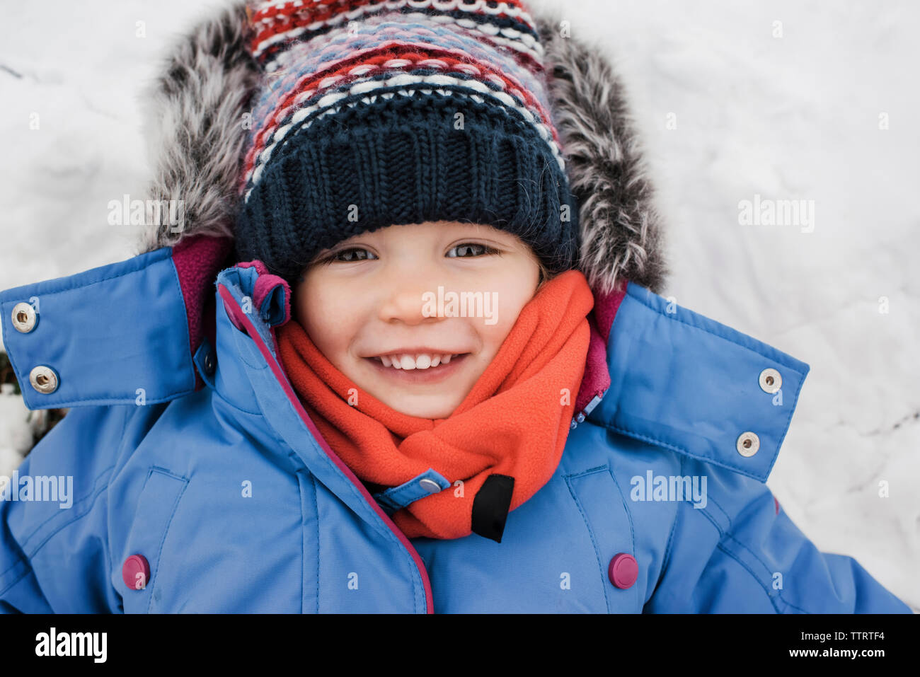 Close-up portrait of girl wearing warm clothing Stock Photo - Alamy