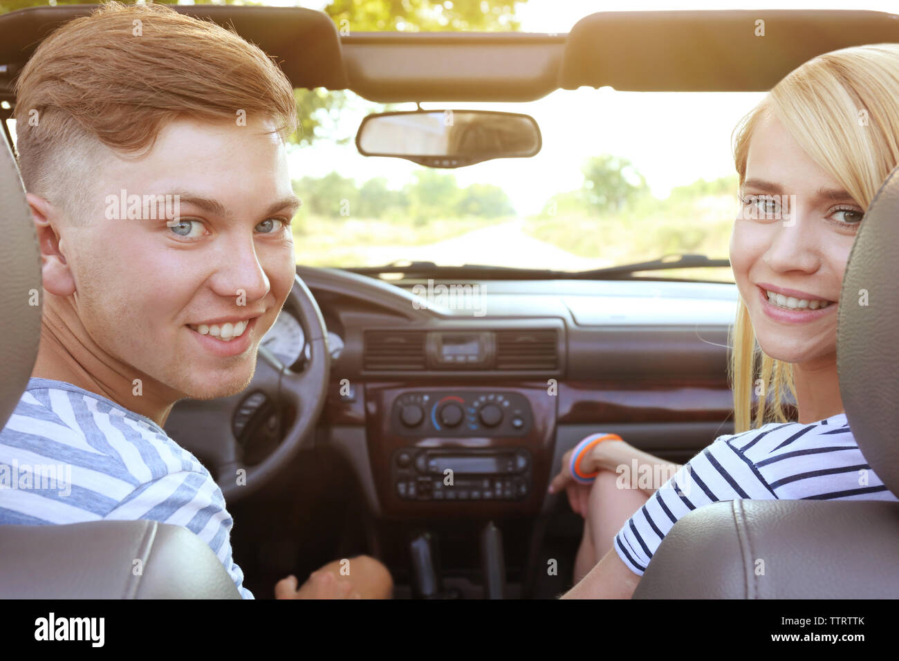 Couple in car Stock Photo - Alamy