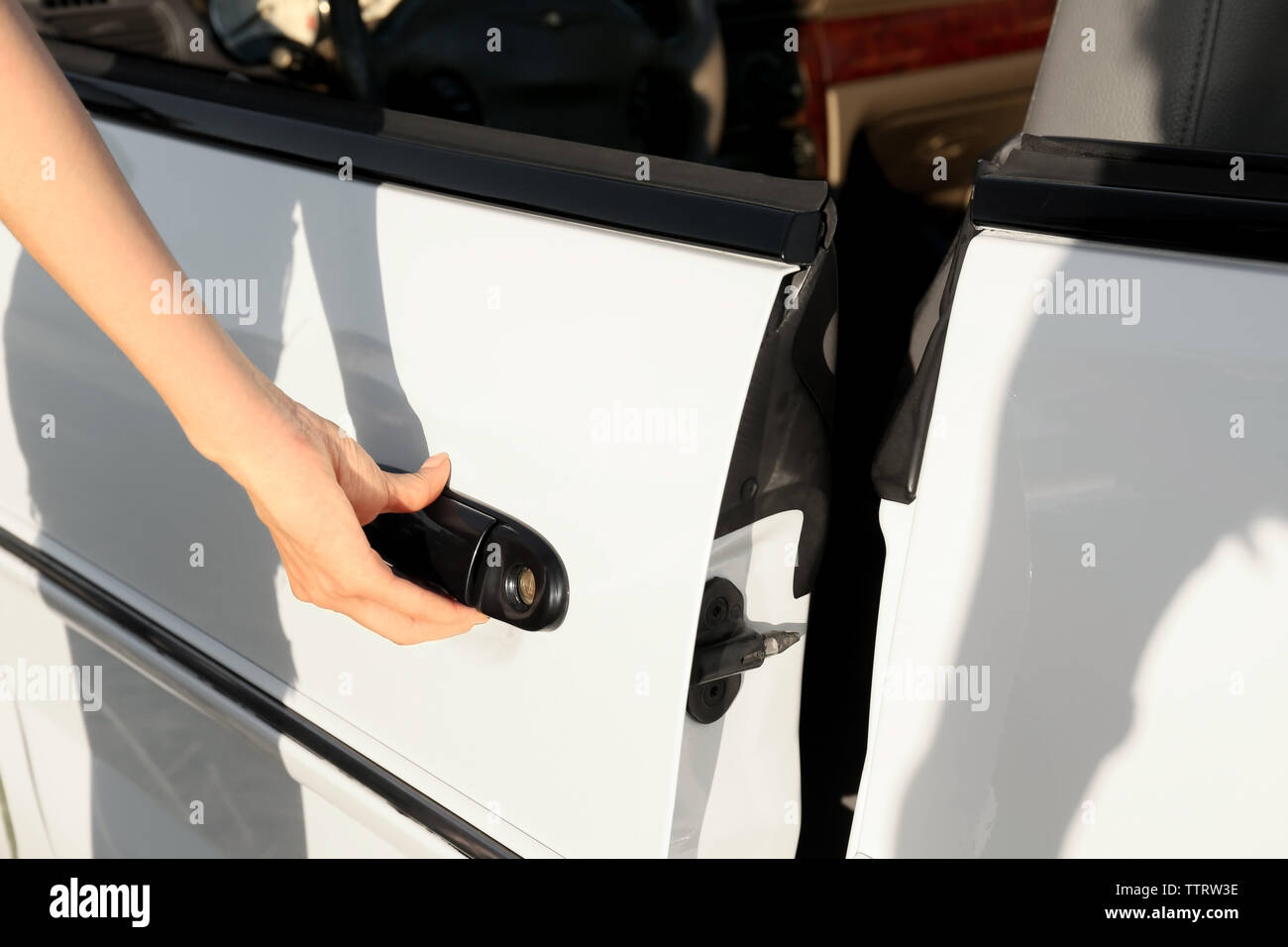 Hand opening car hi-res stock photography and images - Alamy