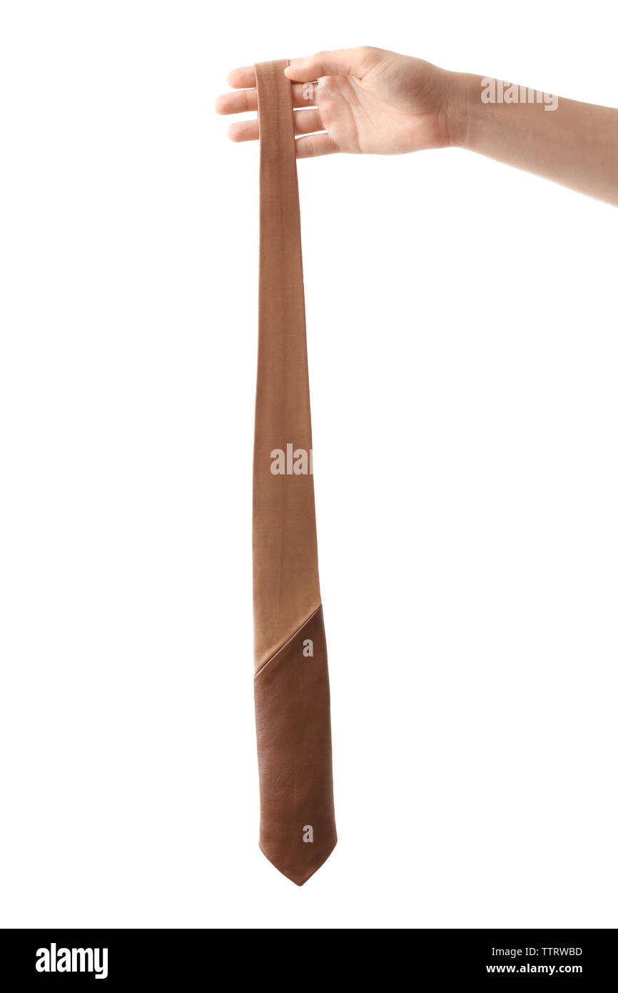 Female hand holding brown tie, isolated on white Stock Photo - Alamy