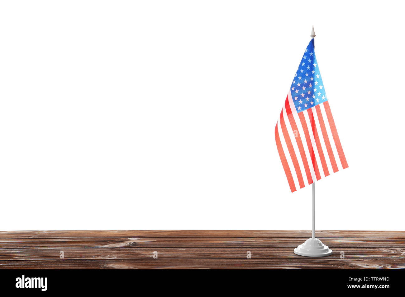American flag on table, isolated on white Stock Photo - Alamy