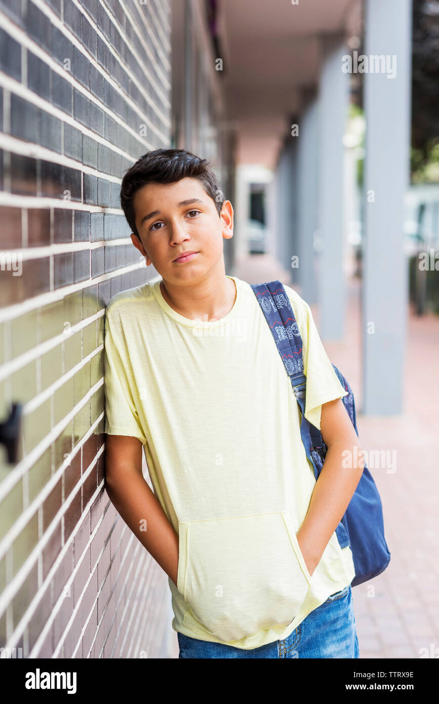 Child standing in front wall hi-res stock photography and images - Alamy