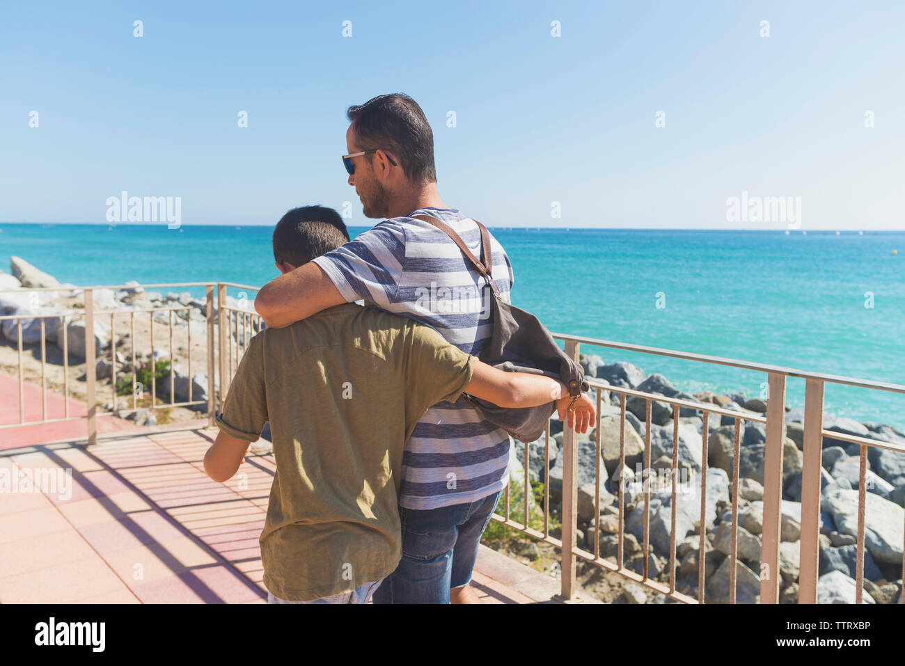 Child on shoulder hi-res stock photography and images - Alamy