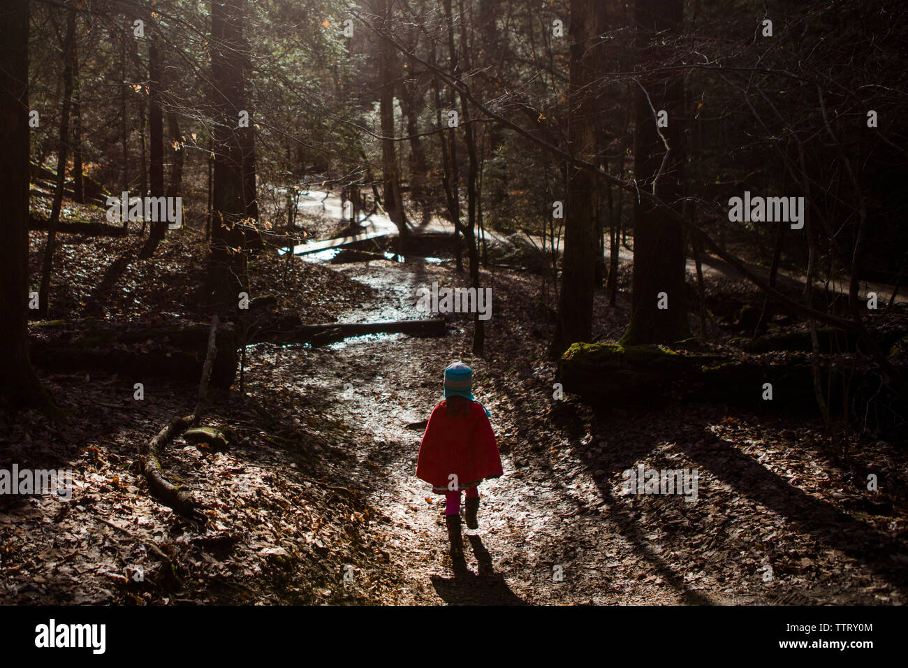 Girl in red cape hi-res stock photography and images - Alamy