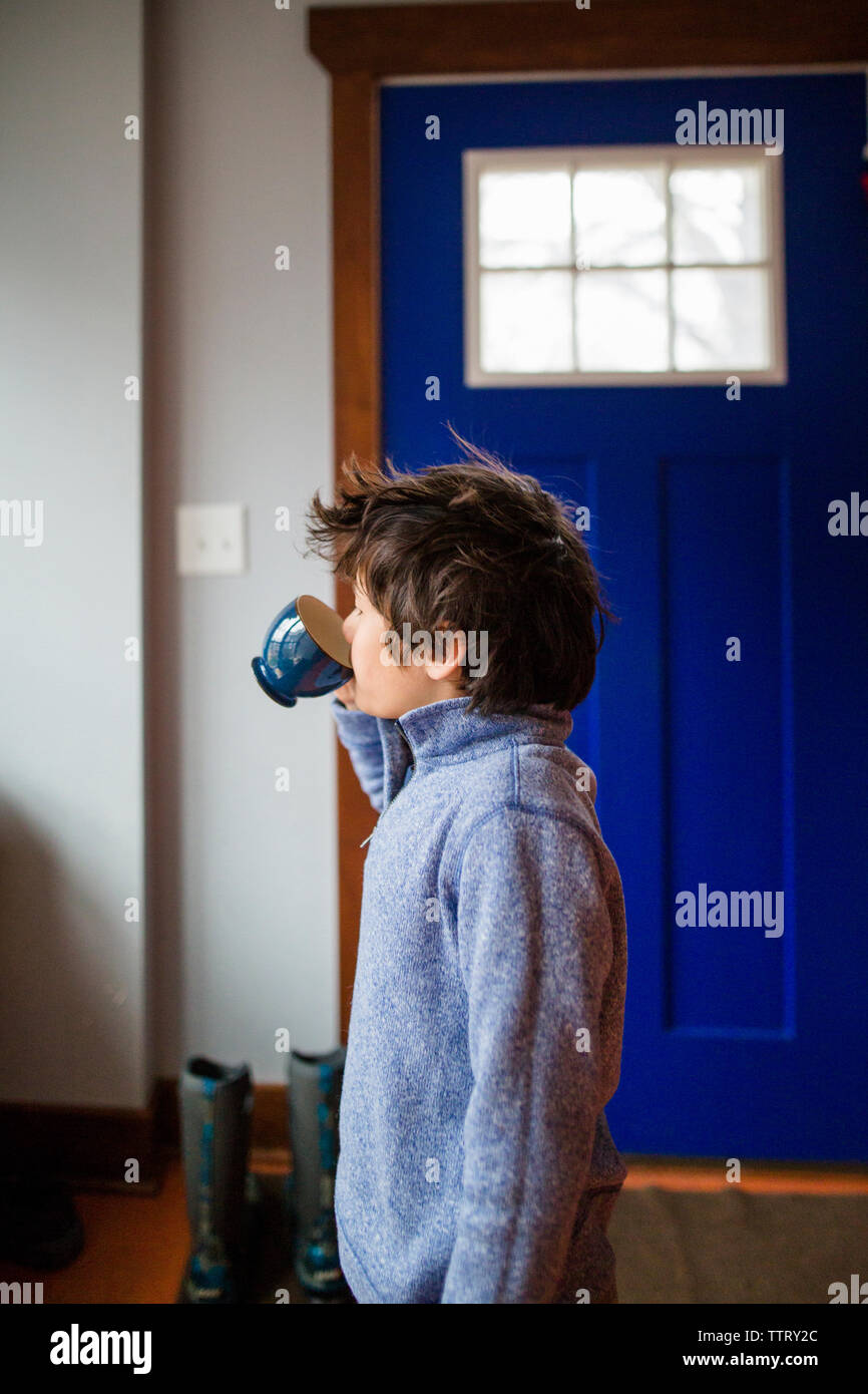 Drinking coffee cup boy hi-res stock photography and images - Alamy