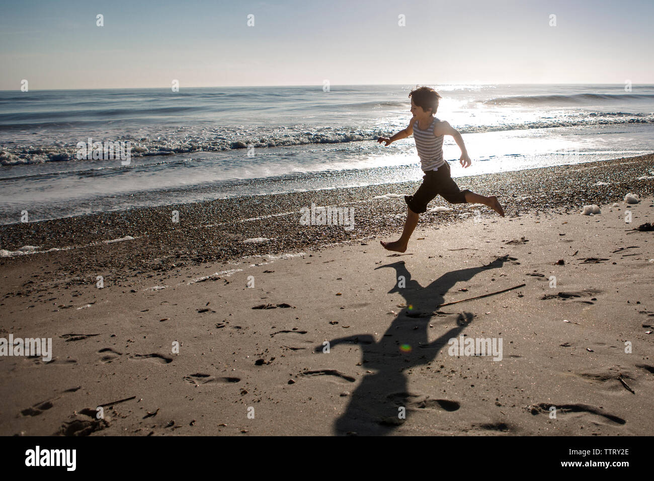 Running beach sea hi-res stock photography and images - Alamy