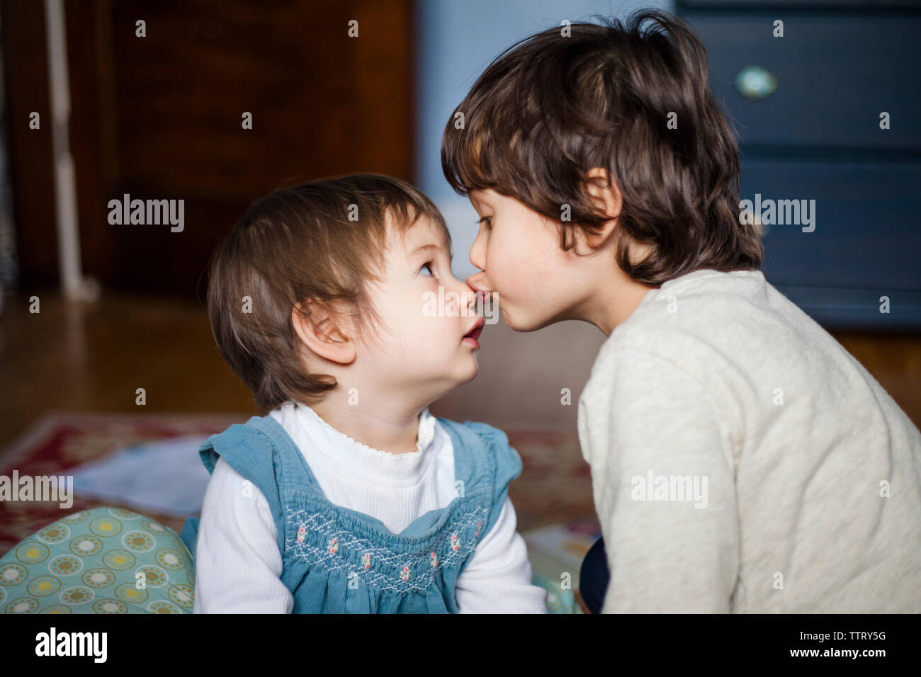 Brother kissing his sister hi-res stock photography and images - Alamy