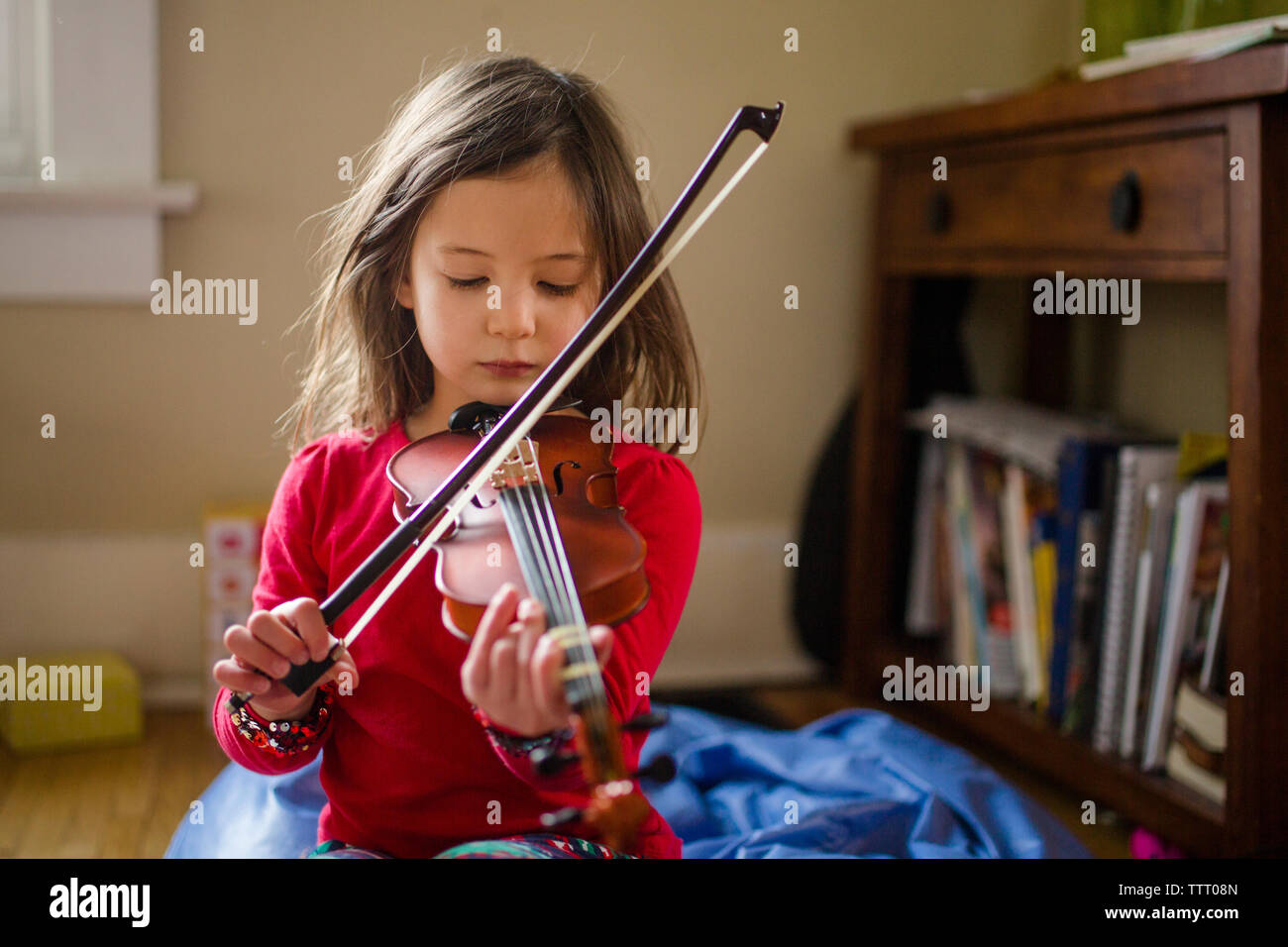 Playing Small Violin