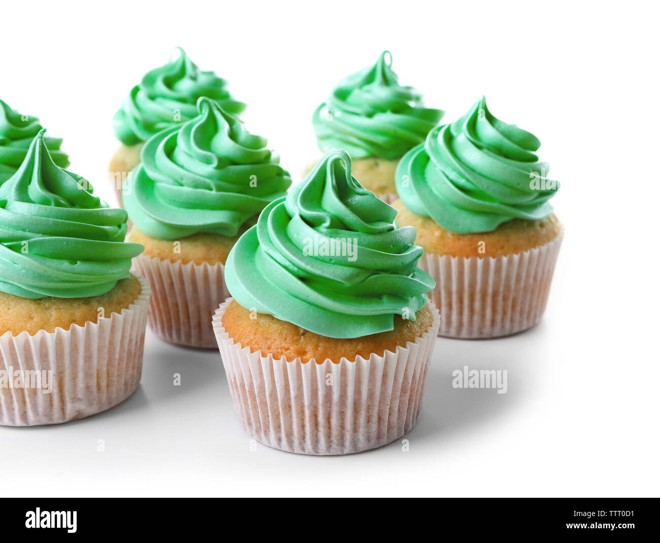 Tasty cupcakes, isolated on white Stock Photo - Alamy