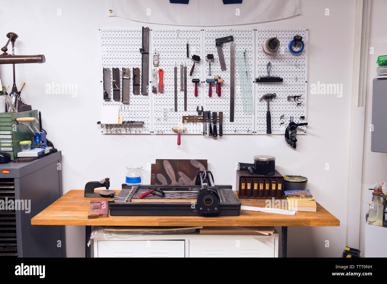 Tools and machinery in printing press Stock Photo - Alamy