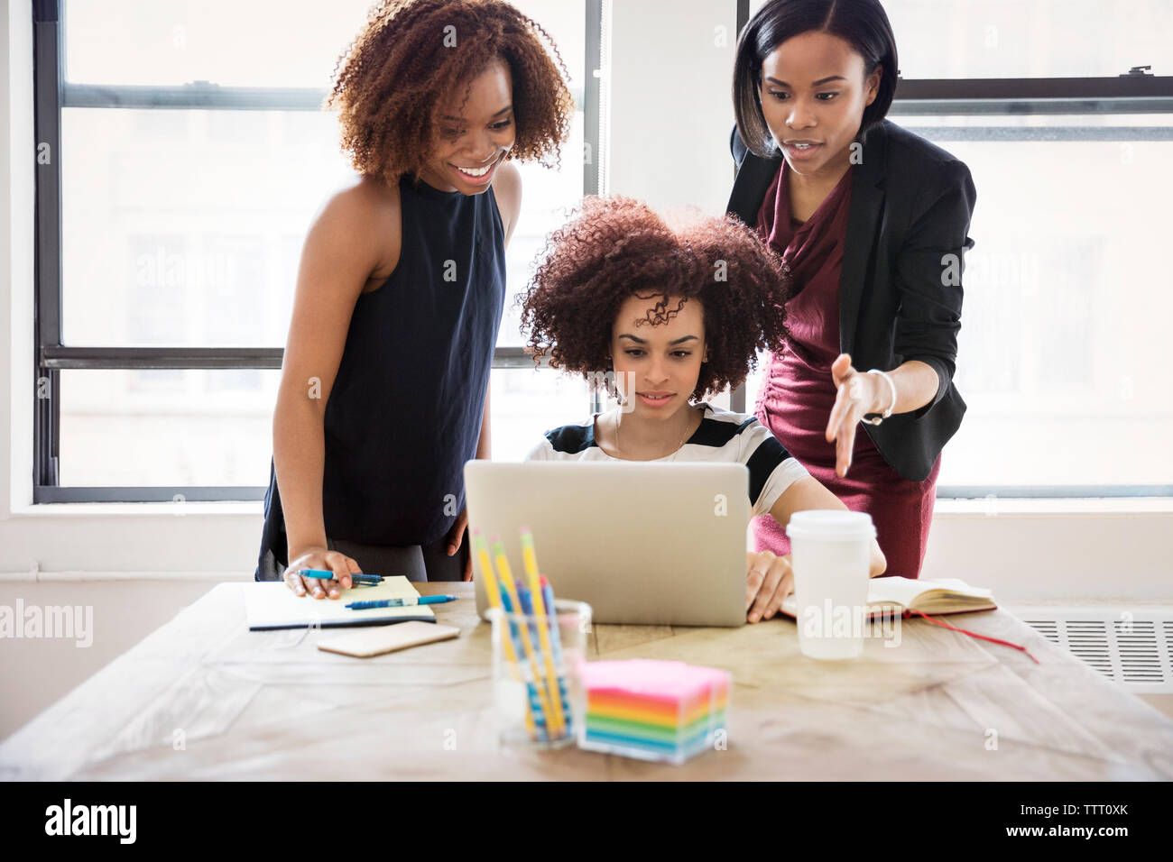 African american workers using laptop hi-res stock photography and ...