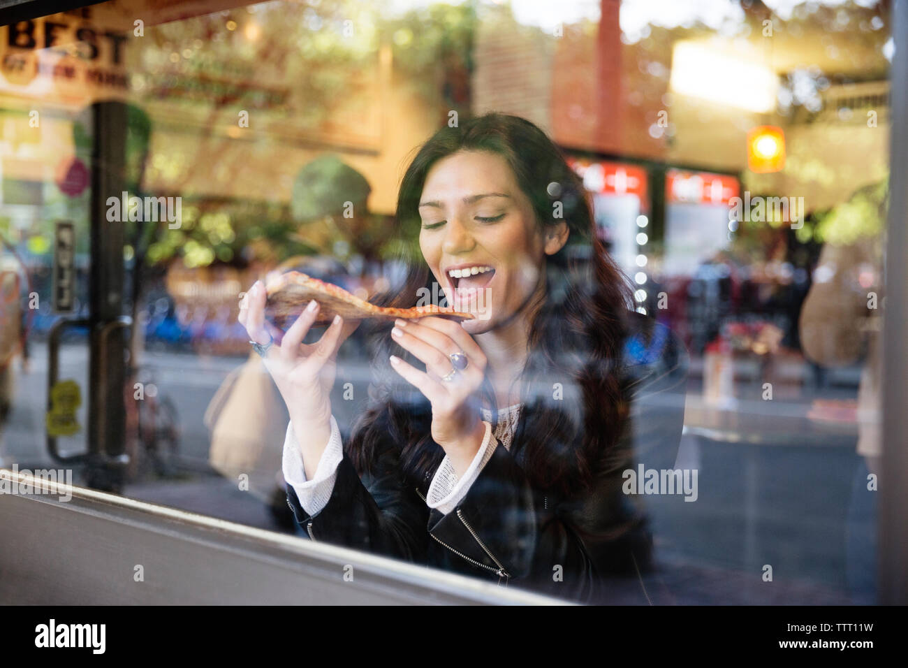 Woman eating happy restaurant hi-res stock photography and images - Alamy