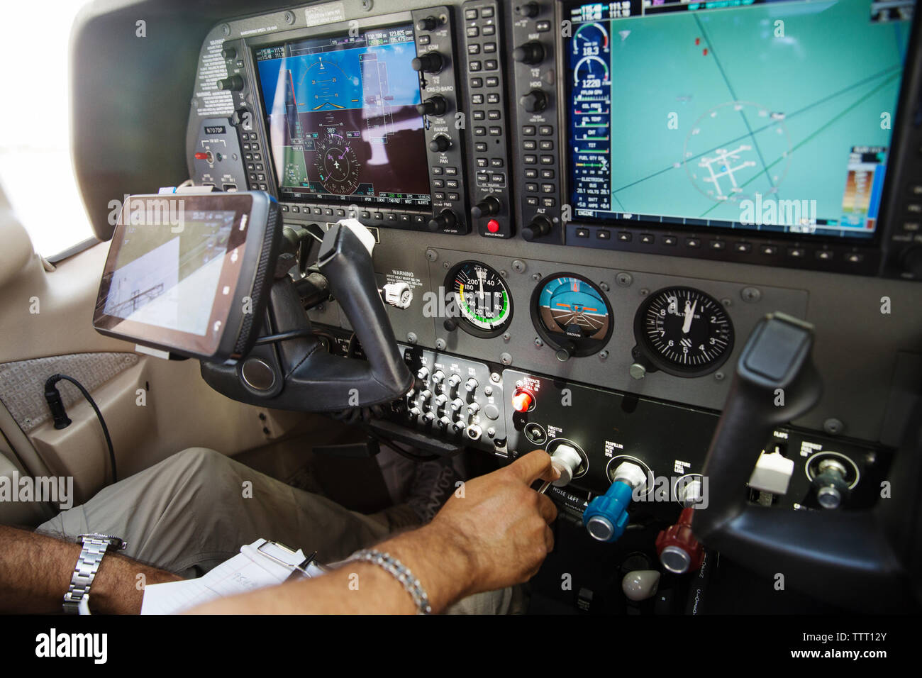 Low section of pilot operating control panel in airplane Stock Photo ...