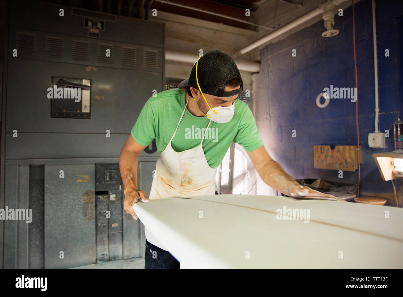 Male worker making surfboard hi-res stock photography and images - Alamy