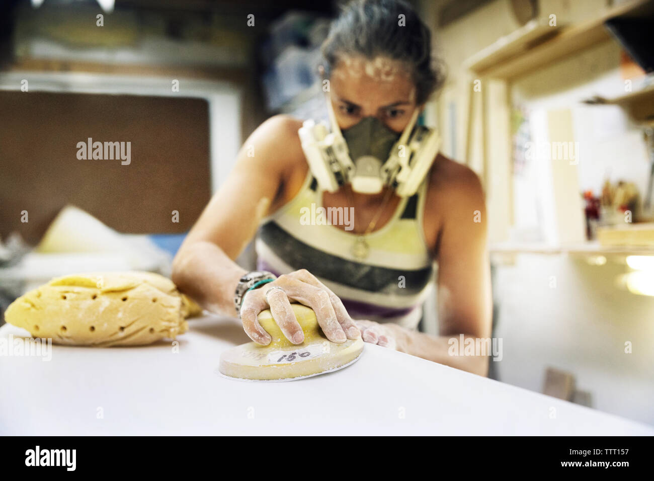 Woman working using a mask hi-res stock photography and images - Alamy