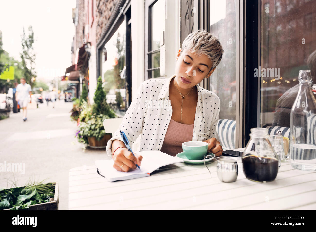 Writing her diary hi-res stock photography and images - Alamy