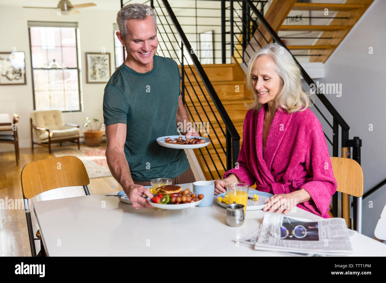 Man Setting The Table