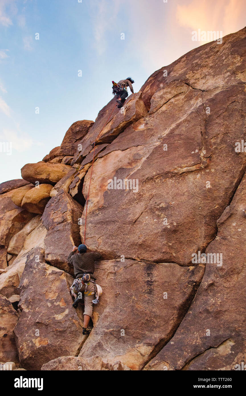 Men climbing hi-res stock photography and images - Alamy