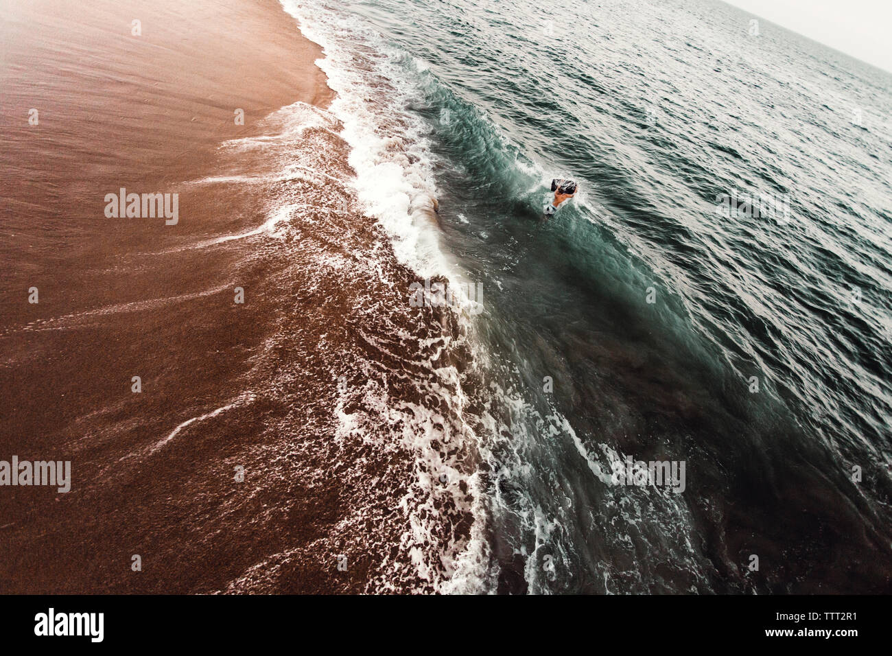 Man drowning in sea at beach Stock Photo - Alamy