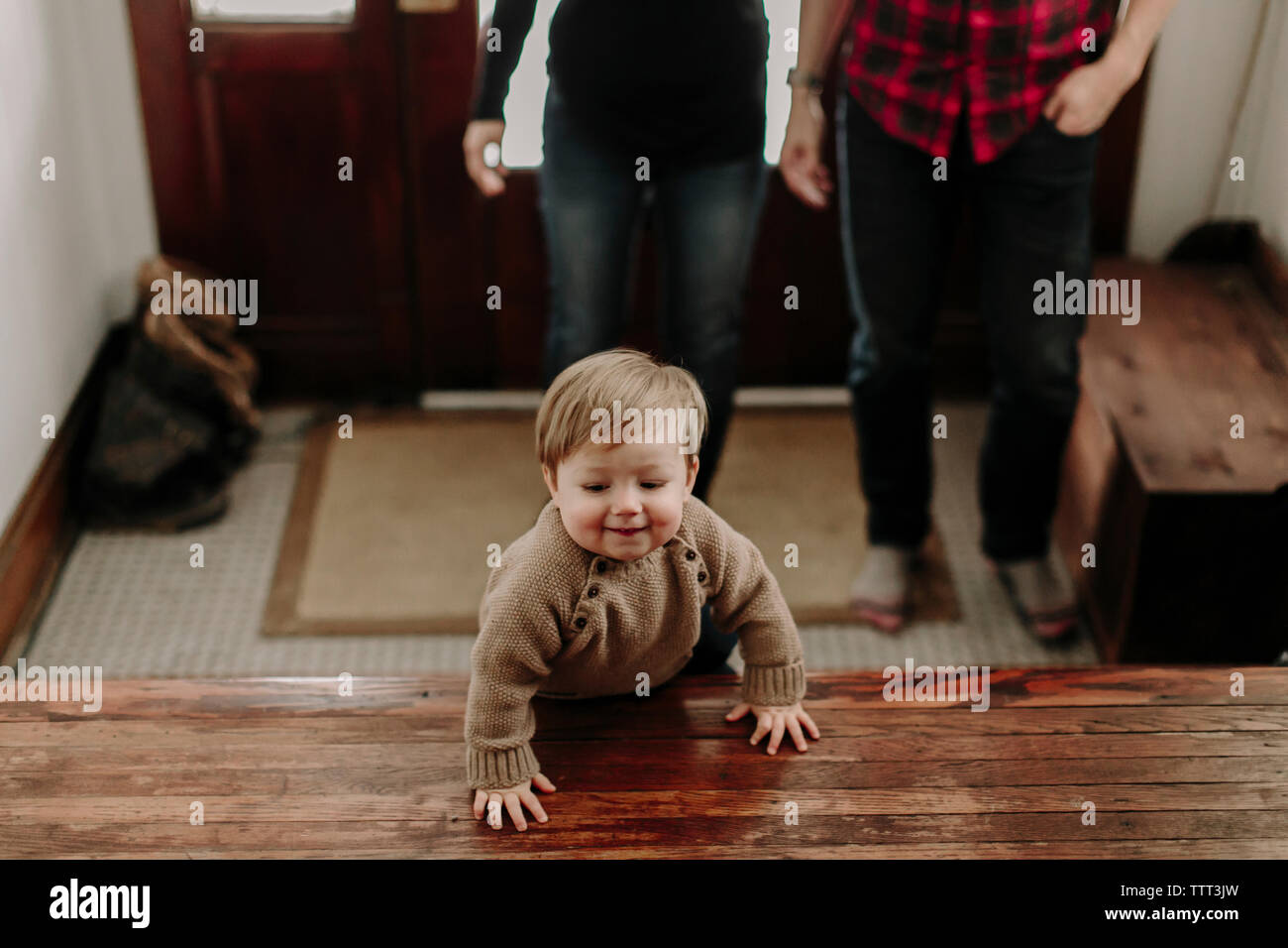 Father and son climbing steps hi-res stock photography and images - Alamy