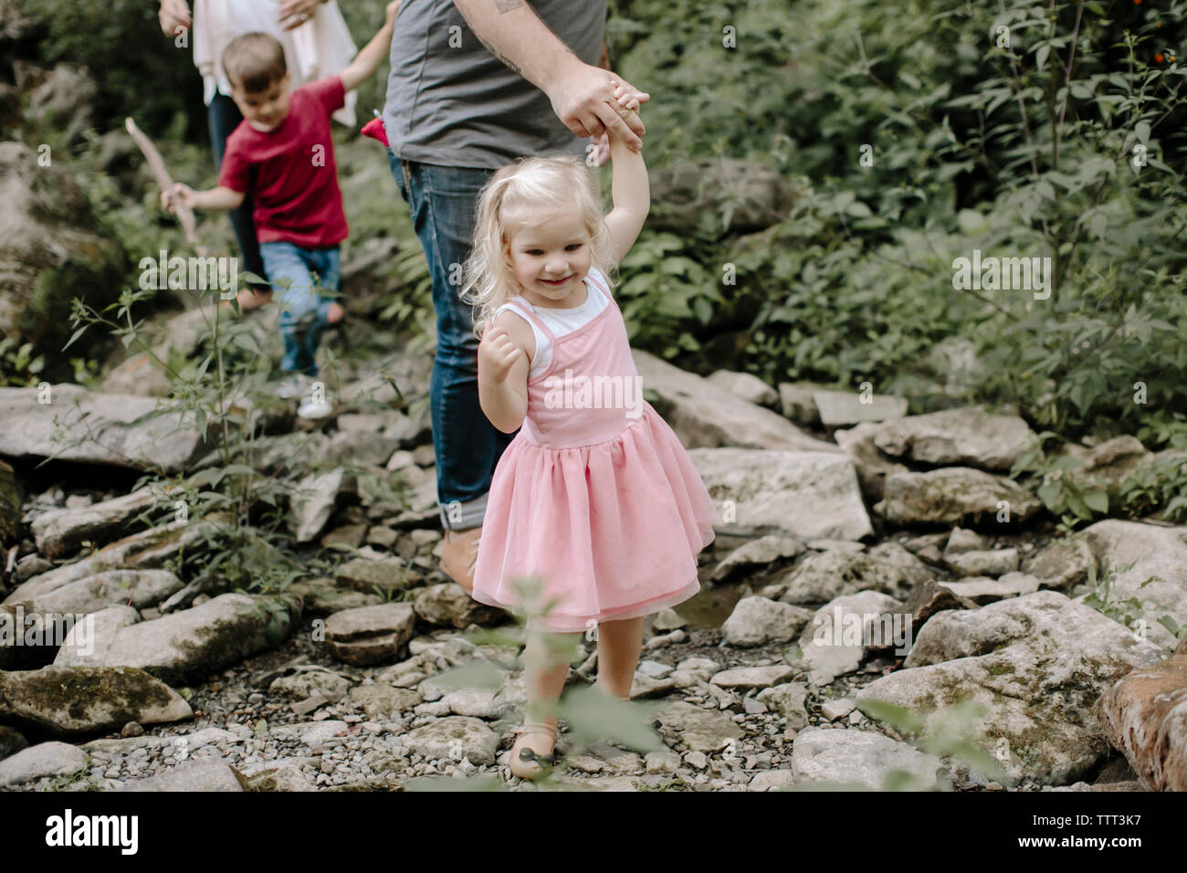 Children on rocks hi-res stock photography and images - Alamy