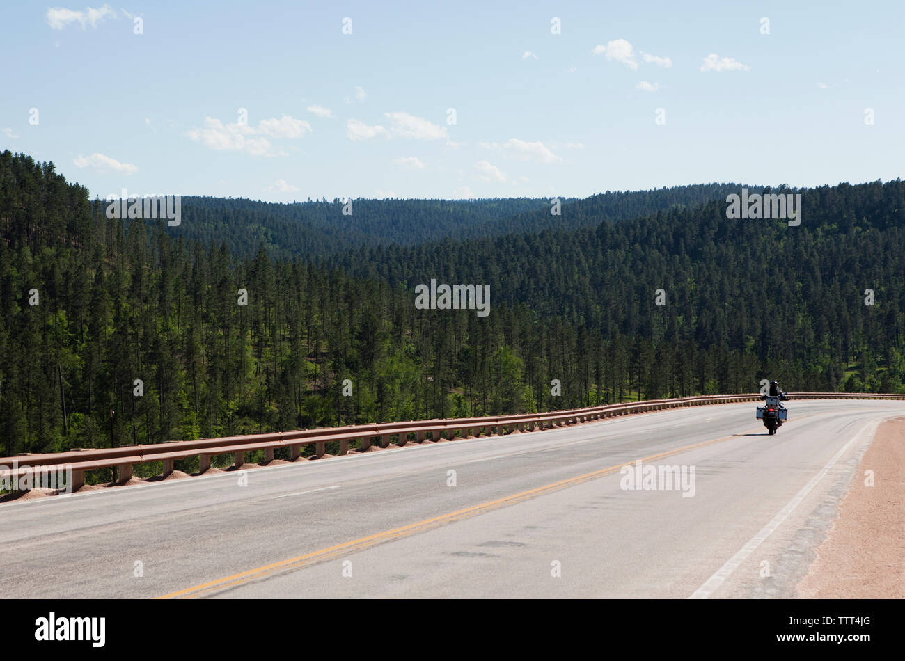 Rear view riding motorcycle hi-res stock photography and images - Alamy