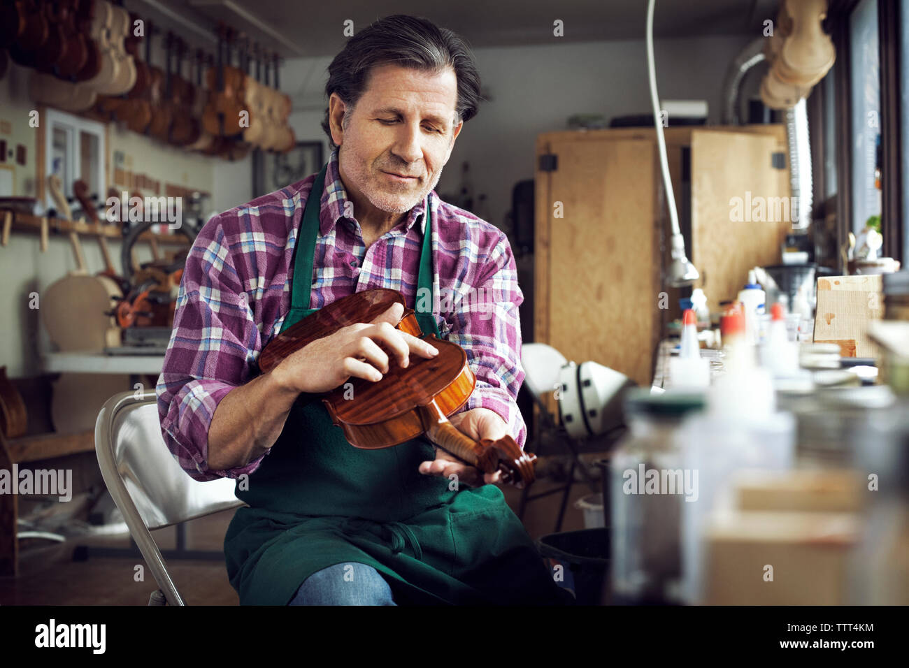 Worker musical instrument hi-res stock photography and images - Alamy