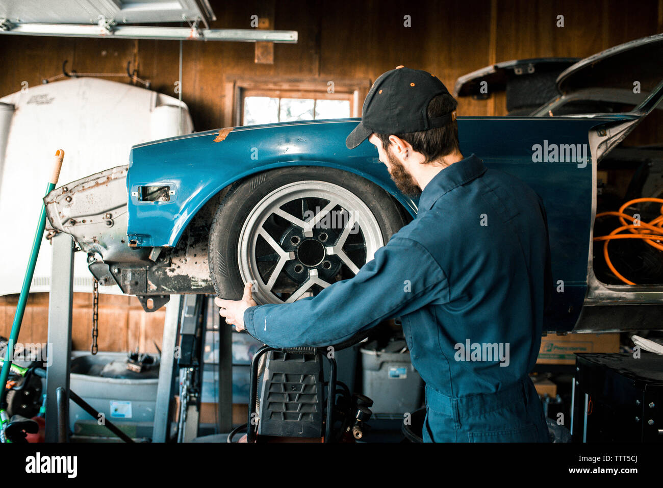 Mechanic in car repairing service hi-res stock photography and images ...