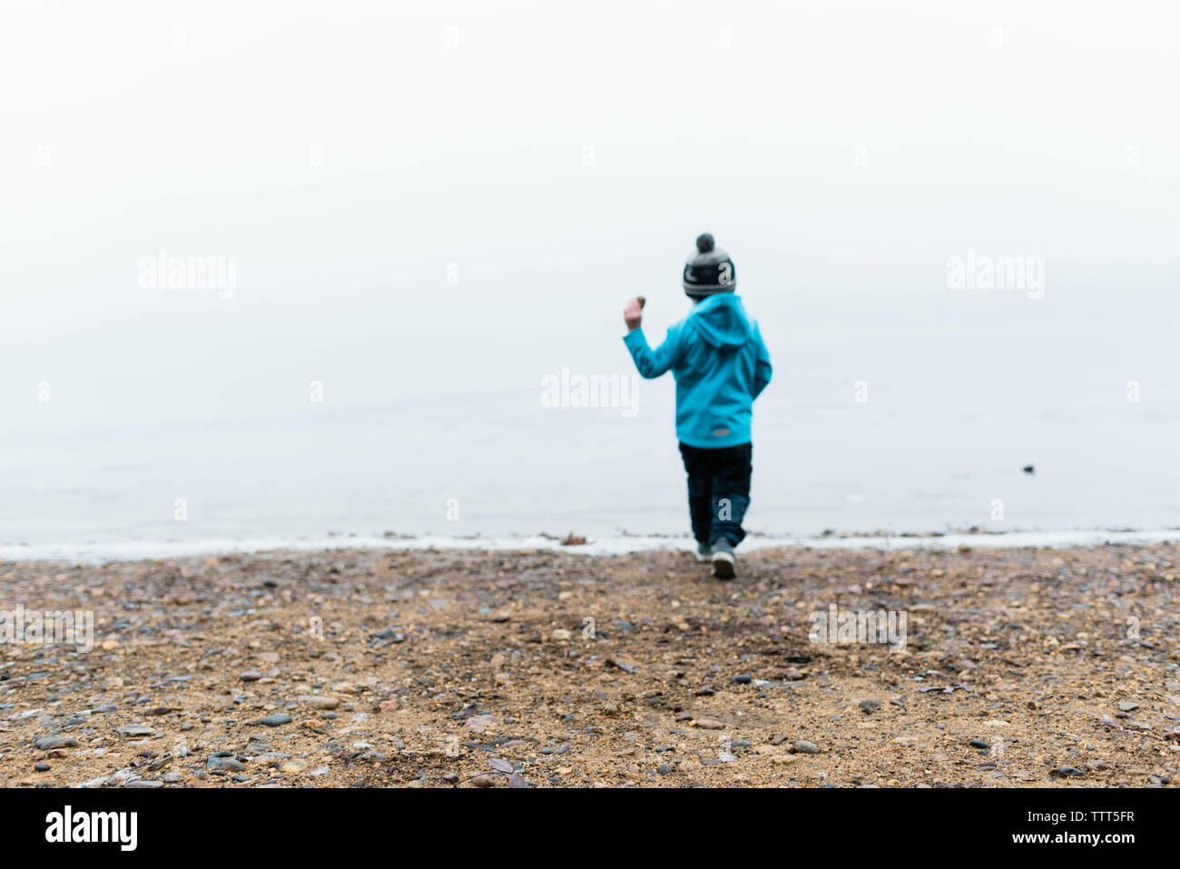 Boy throwing rocks hi-res stock photography and images - Alamy