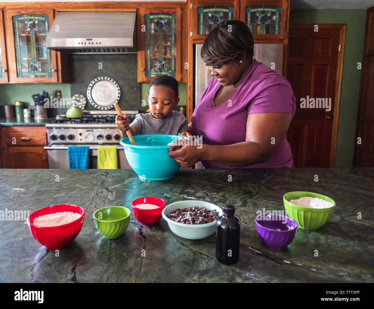 Mother and son making cookies Stock Photo - Alamy
