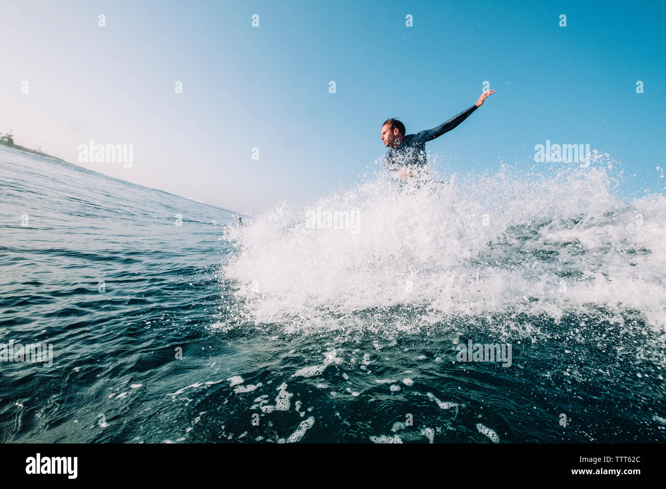 Surfer takes off hi-res stock photography and images - Alamy