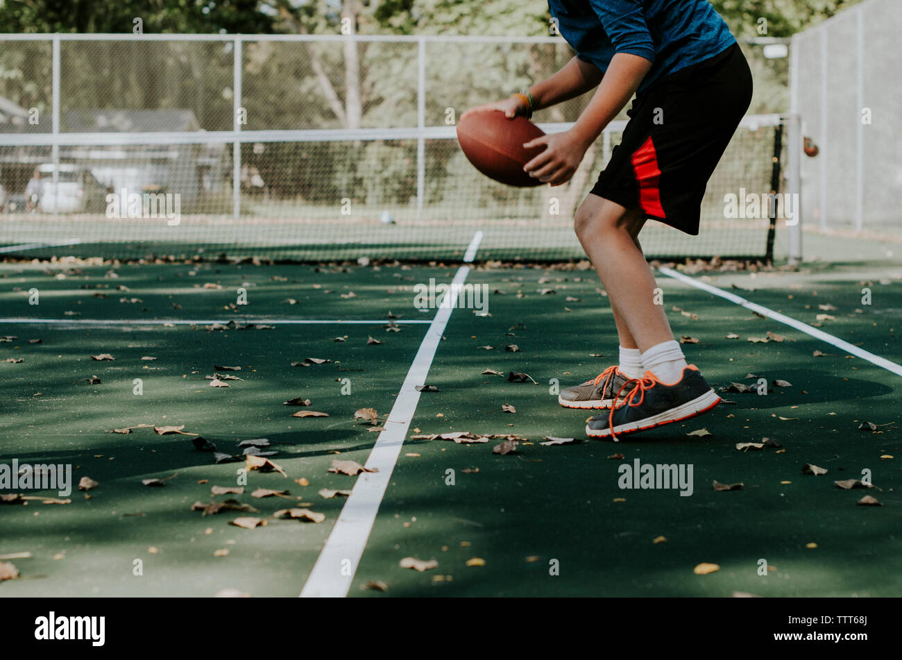 Boy holding rugby ball hi-res stock photography and images - Alamy