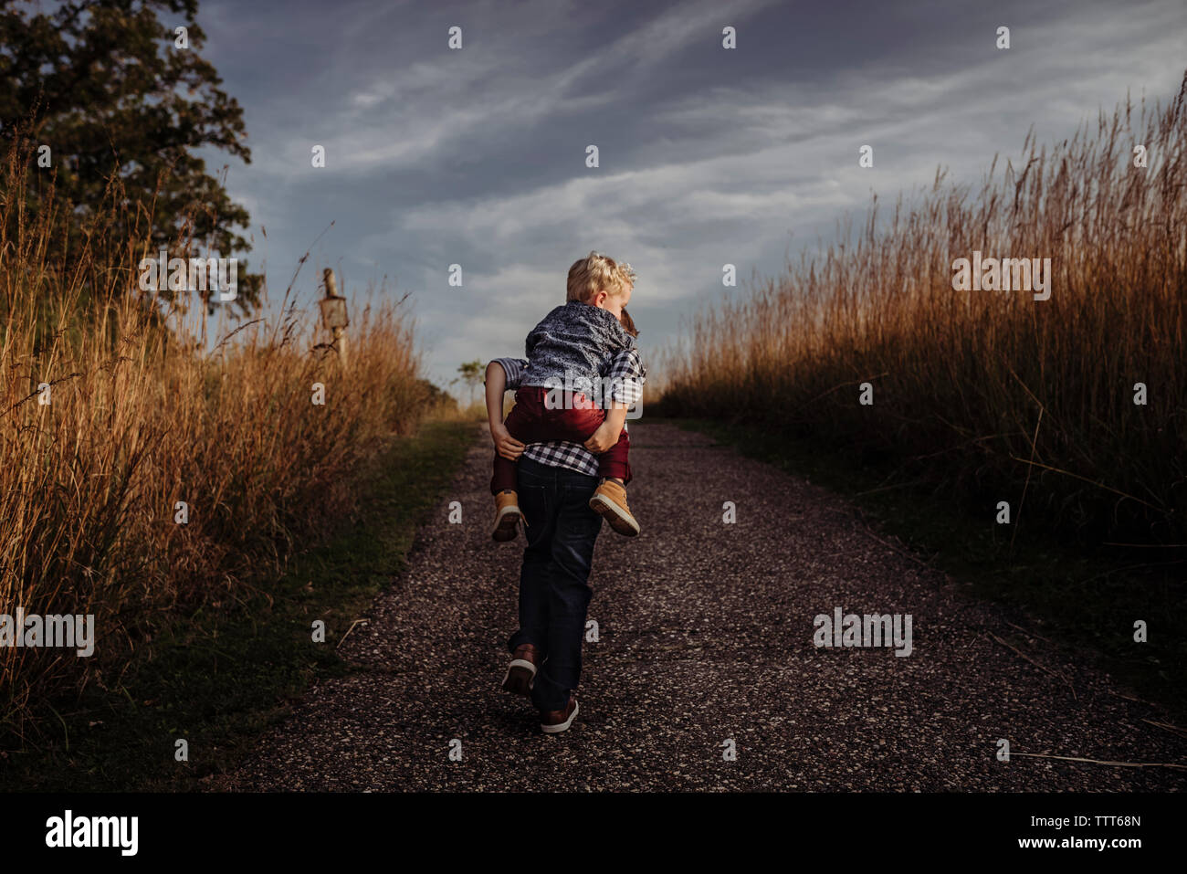 Piggyback brothers hi-res stock photography and images - Alamy