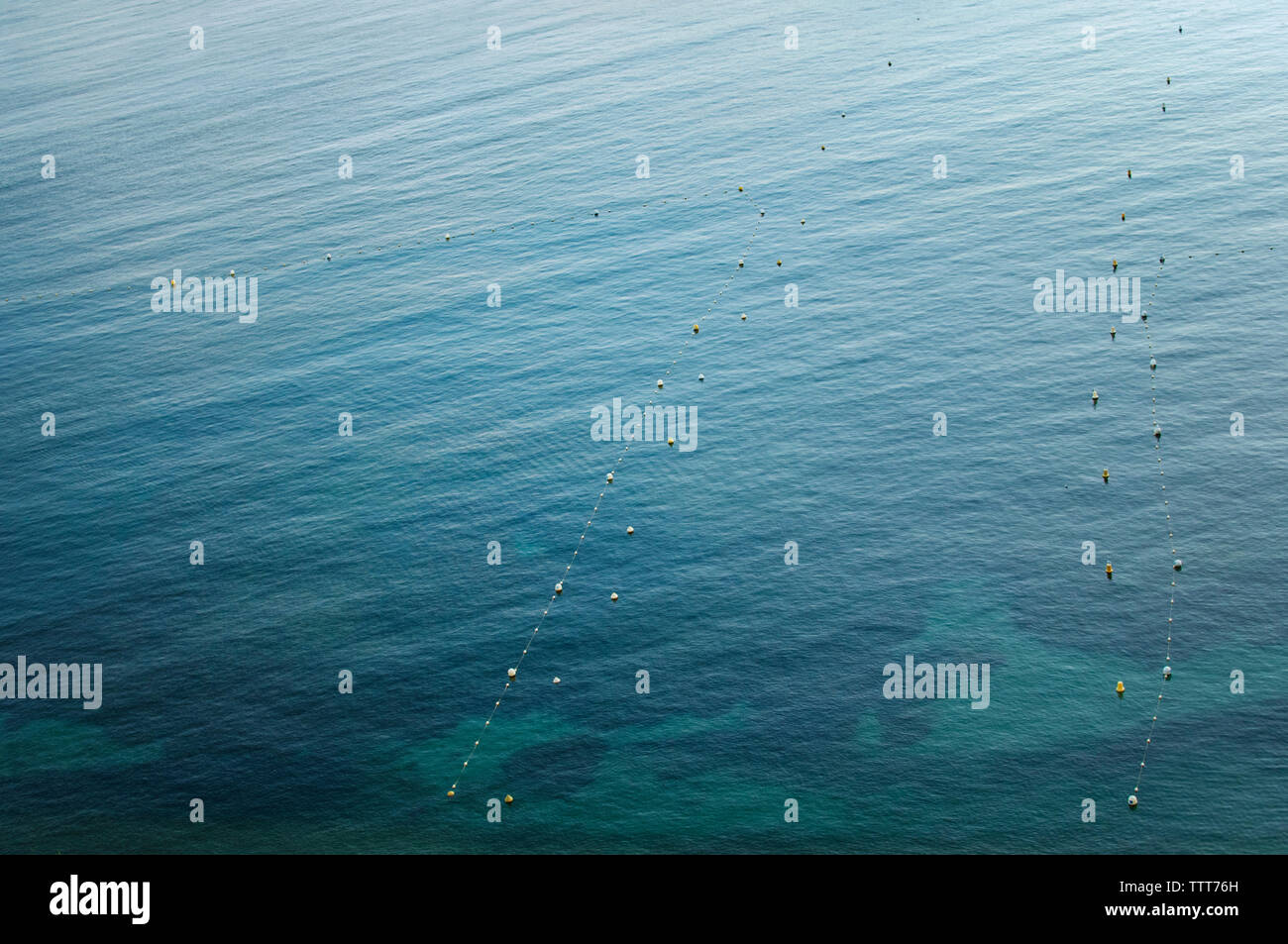 High angle view of buoys floating on sea Stock Photo - Alamy