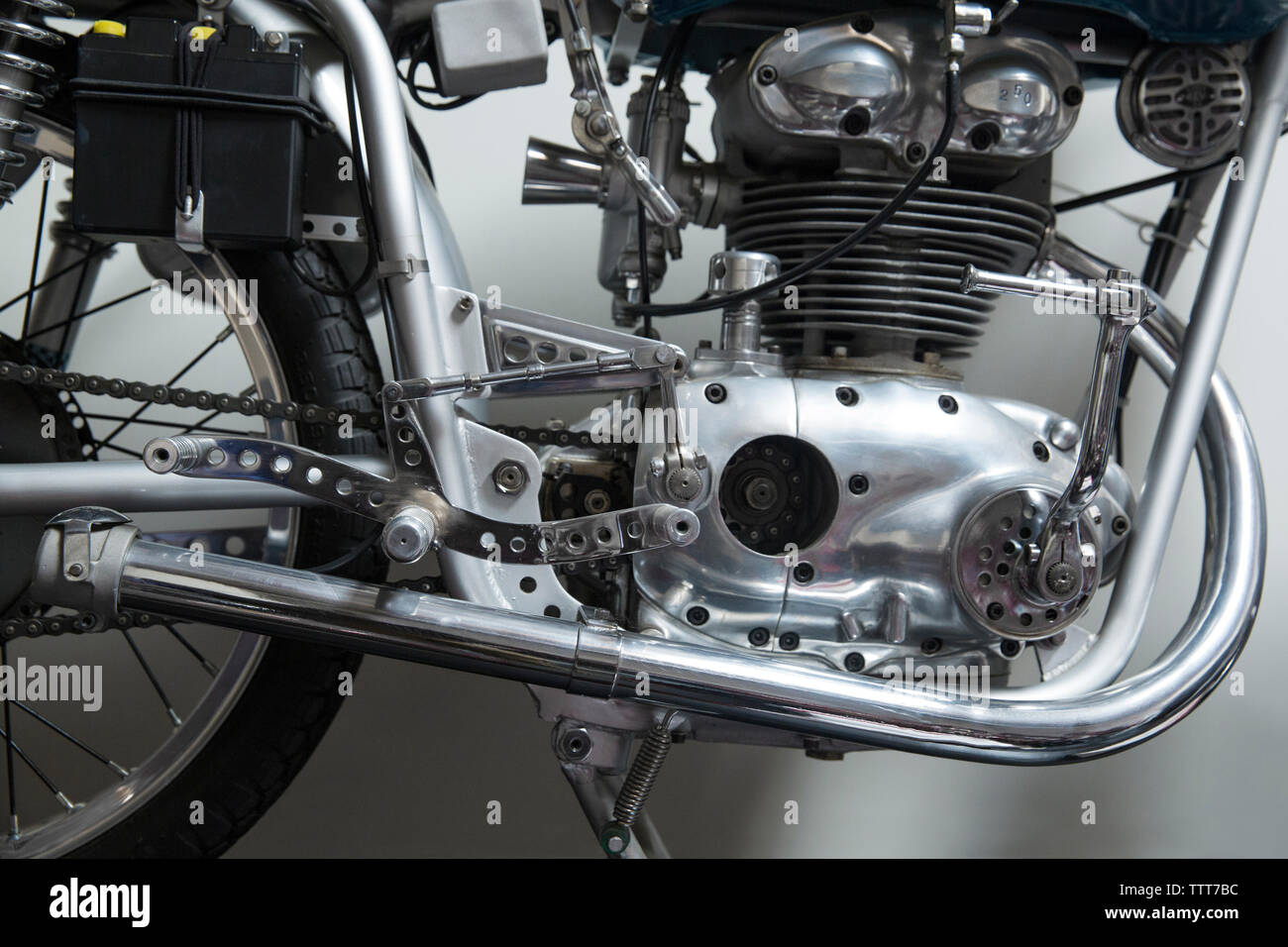 Close-up of motorcycle engine against white wall Stock Photo - Alamy