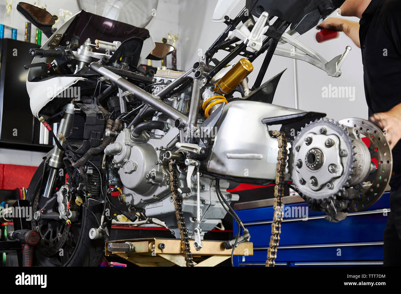 Mechanic working motorcycle workshop High Resolution Stock Photography ...